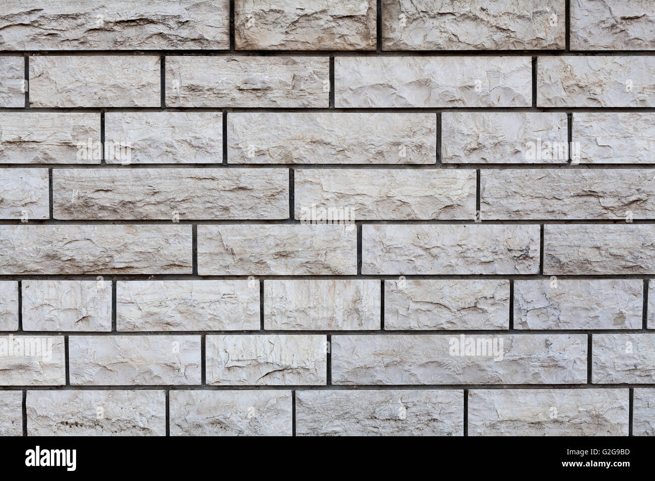 Aged brown Rectangular stone wall texture closeup Stock Photo - Alamy
