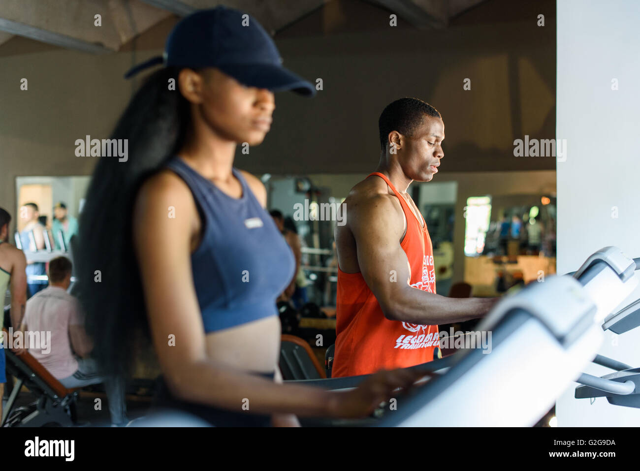 Close-up side view of sporty black african-american couple man and ...
