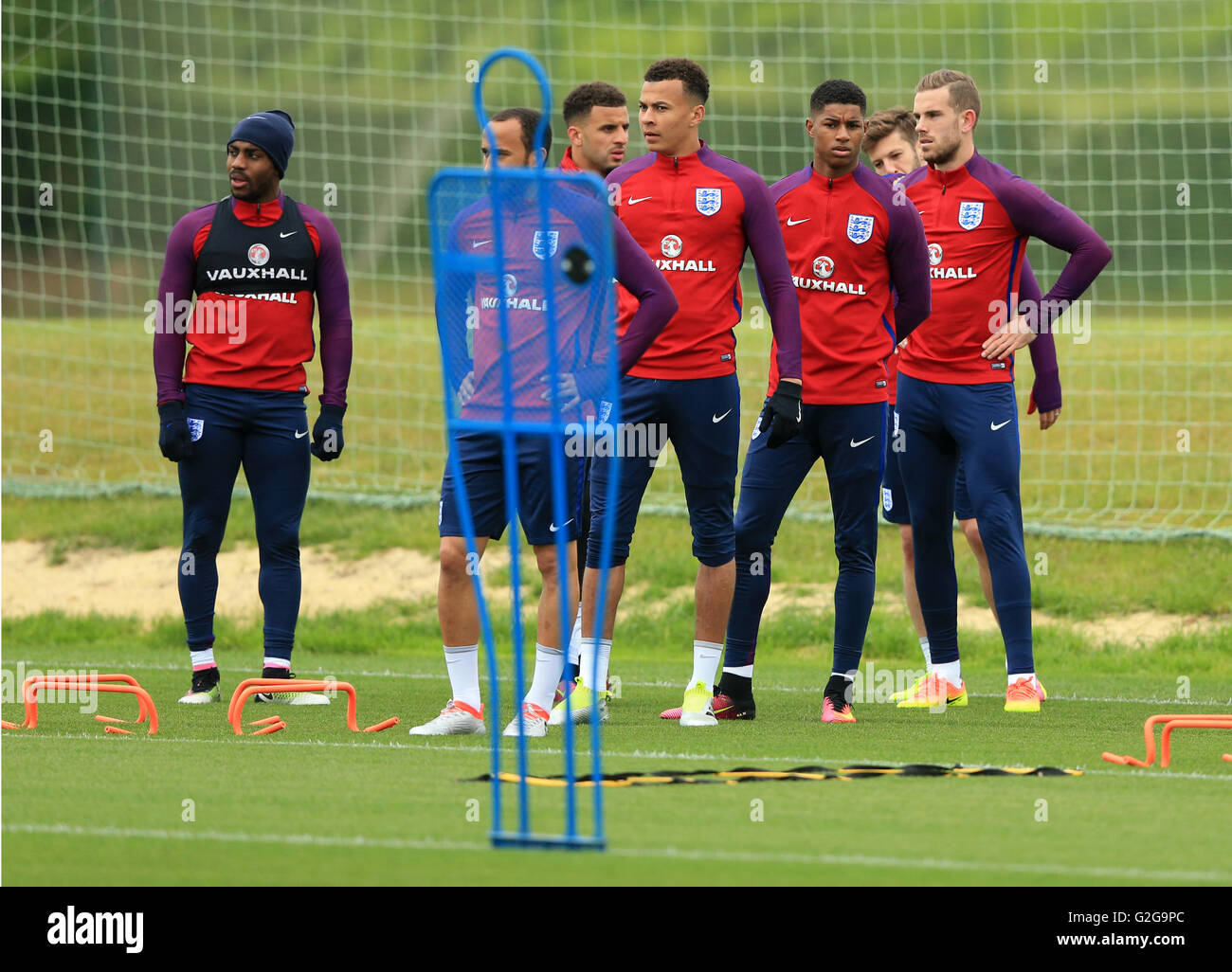 England's Deli Alli (centre) and Marcus Rashford (third right) during a ...