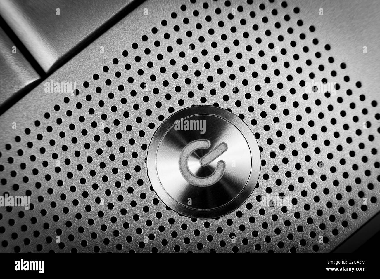 silver color power button macro closeup with holes grid arround Stock ...