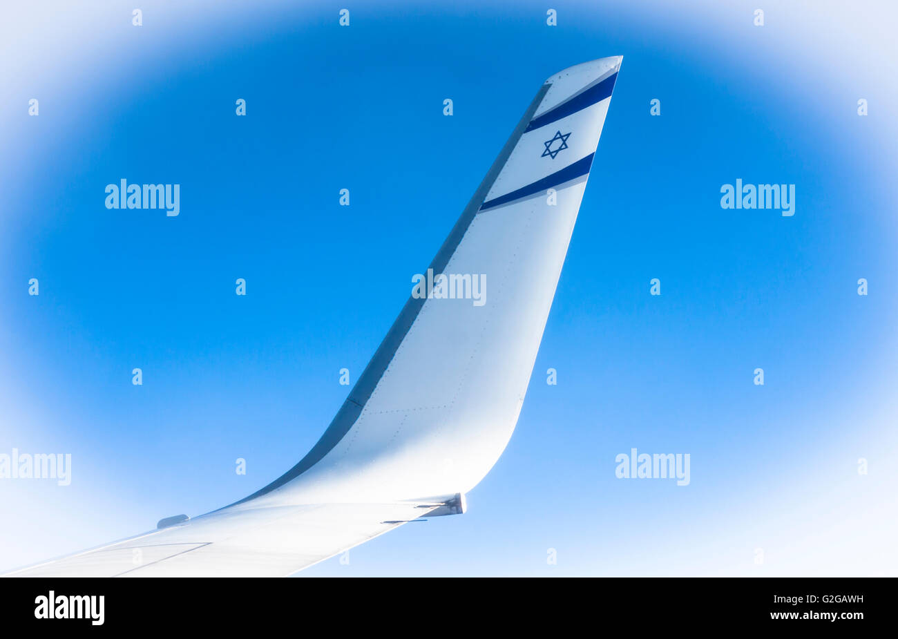 Israeli flag on plane wing on blue sky background Stock Photo - Alamy