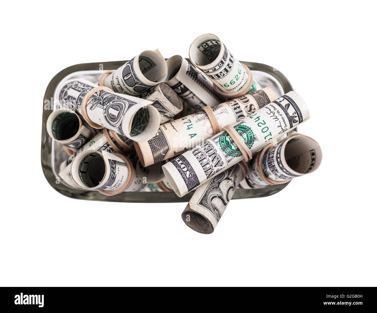 Dollars rolled up with rubber band in jar isolated on white background ...