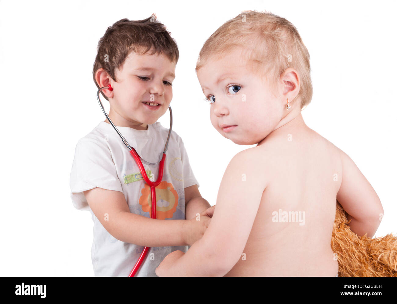 Littl Boy and Girl playing doctor isolated on white background Stock ...