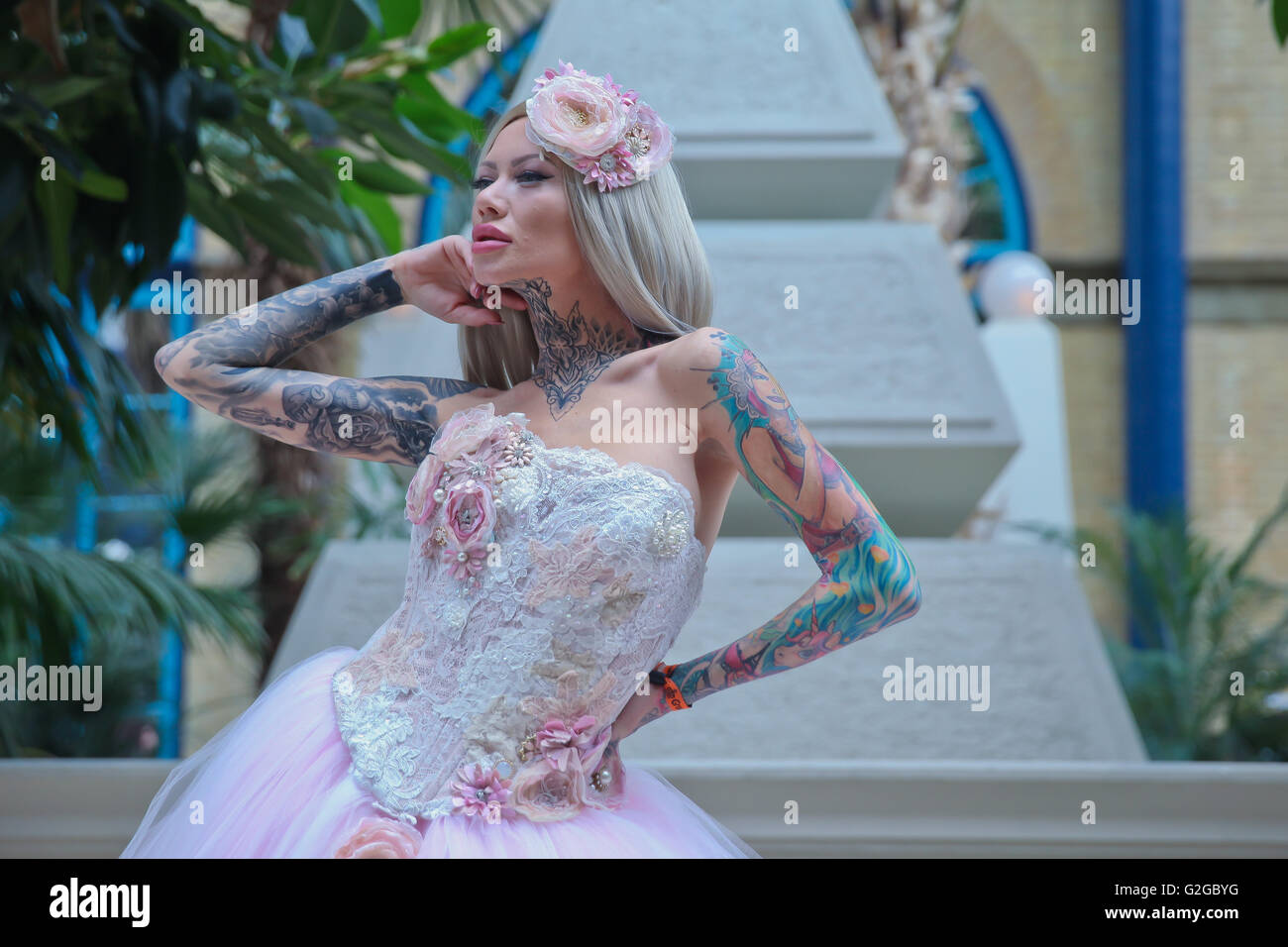 Becky Holt showcasing tattoos and wedding dress by Philippa Lusty at ...