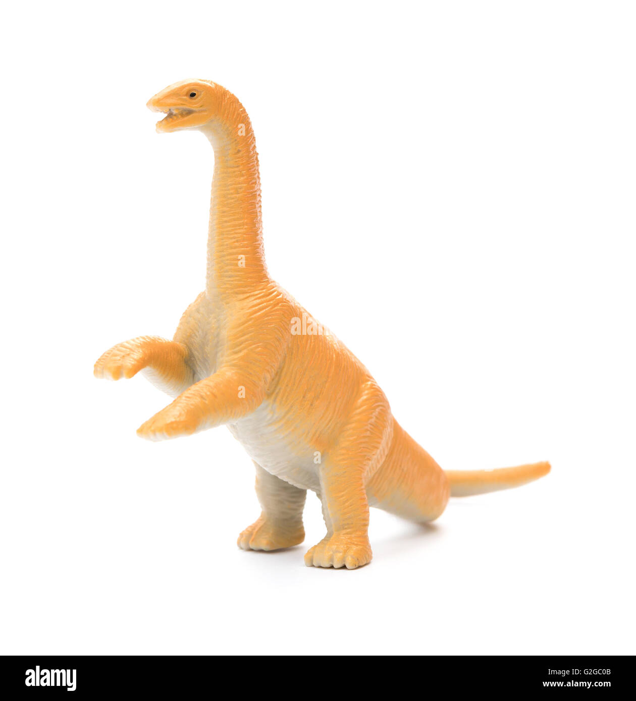 orange diplodocus toy on a white background Stock Photo - Alamy