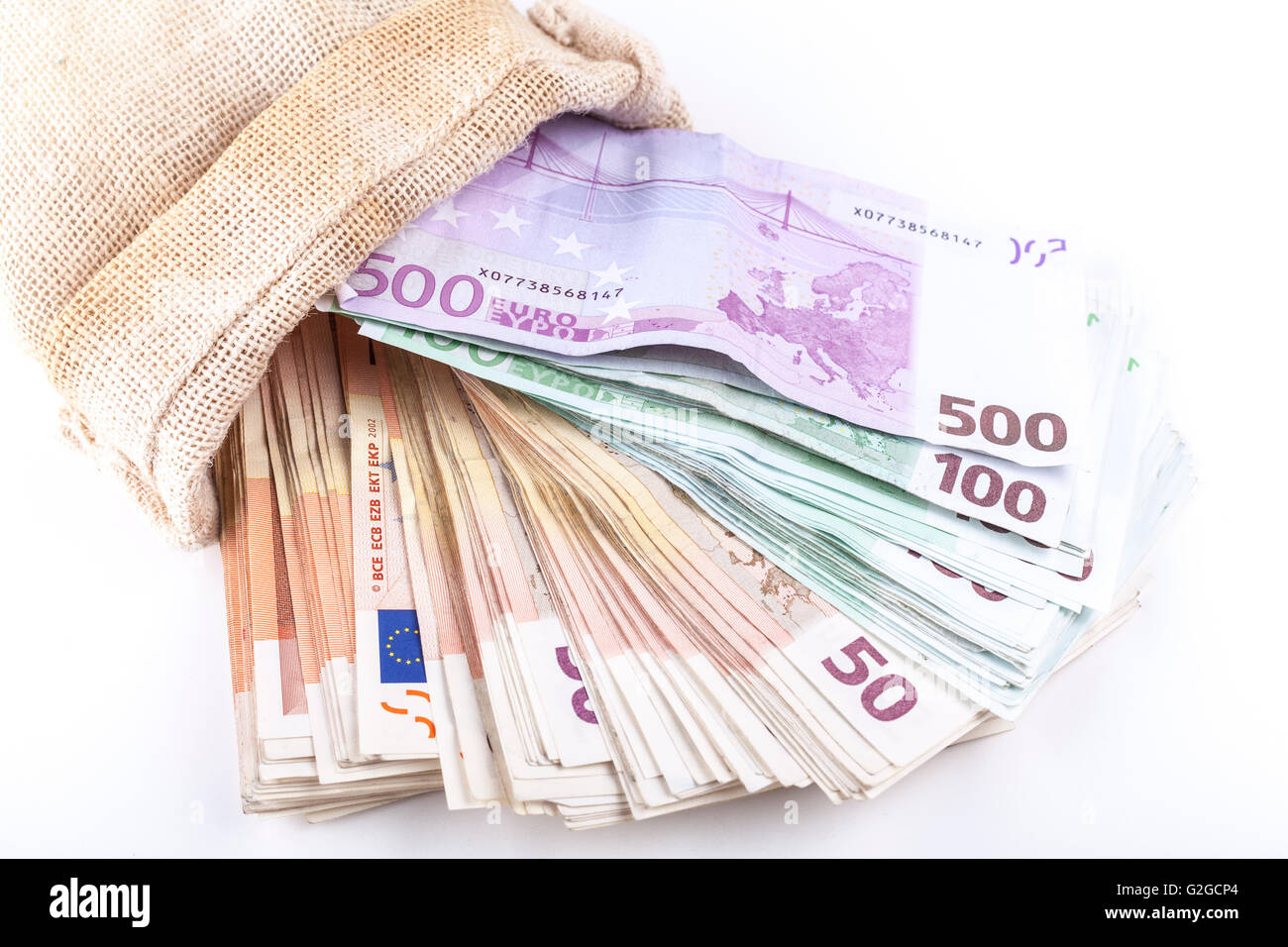 A bag full with euro banknotes isolated on white background Stock Photo ...