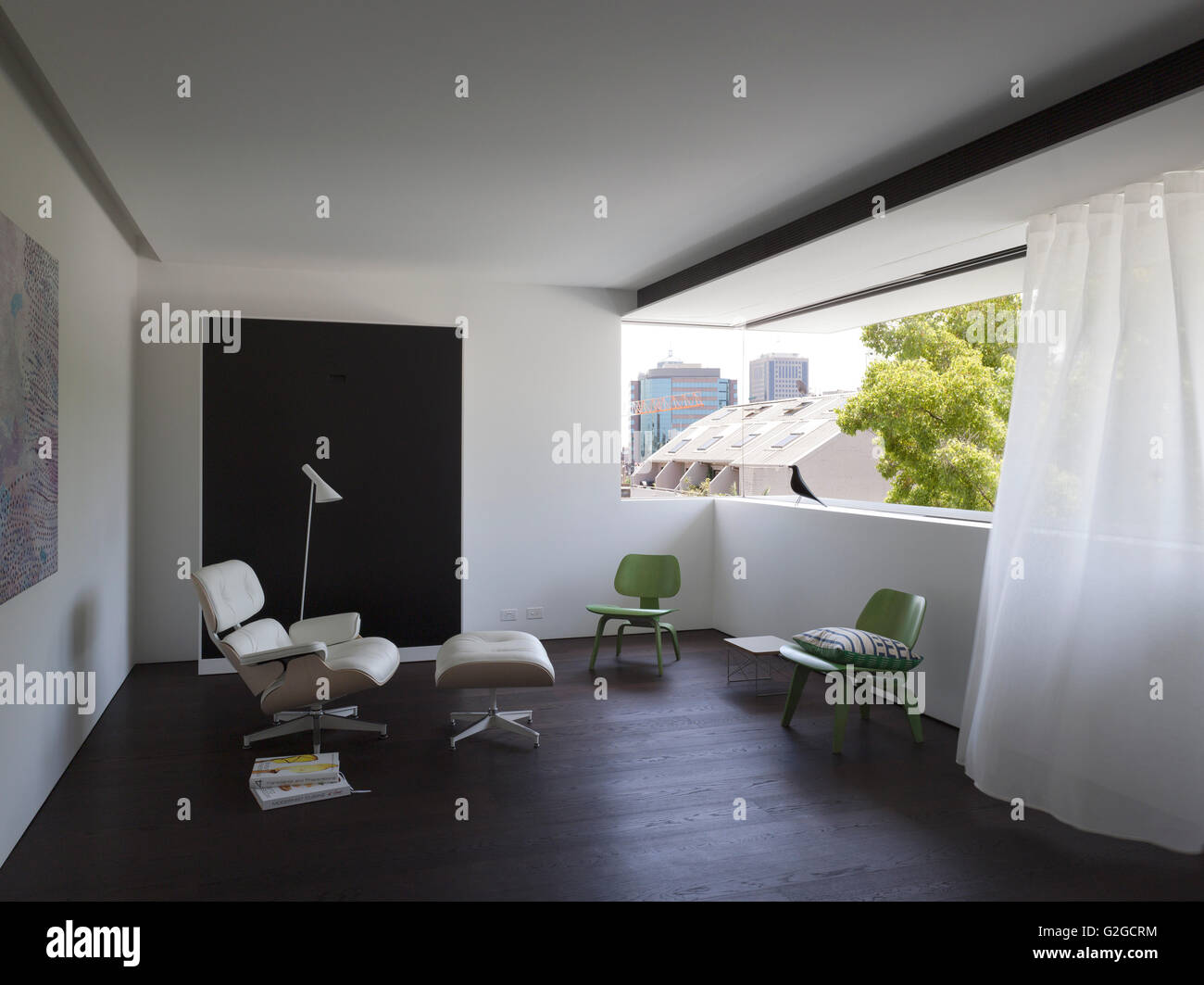 Upper level living space / guest bedroom with city view & billowing ...