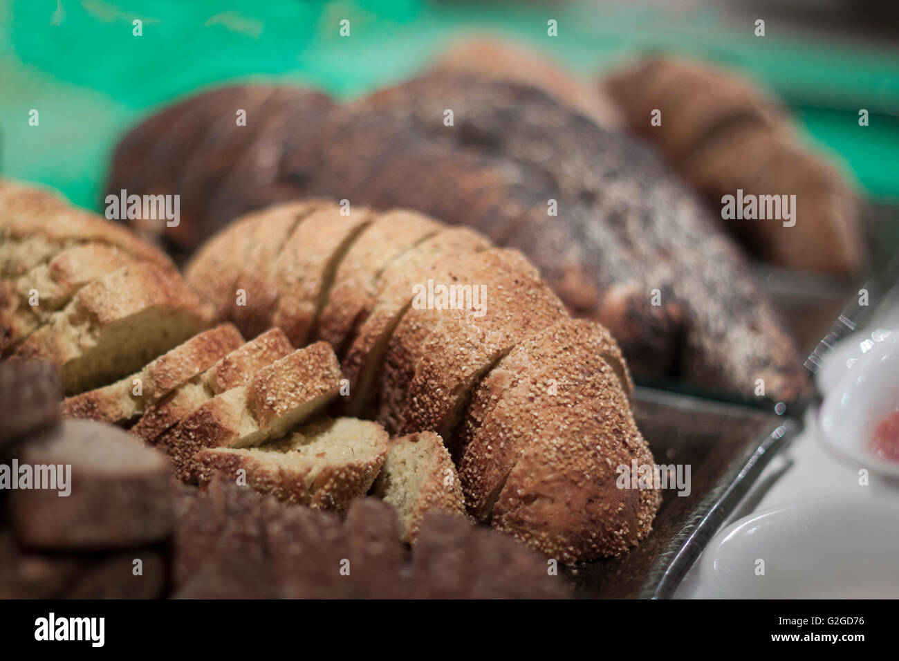 Multiple types of Sliced bread closeup with selective focus Stock Photo ...
