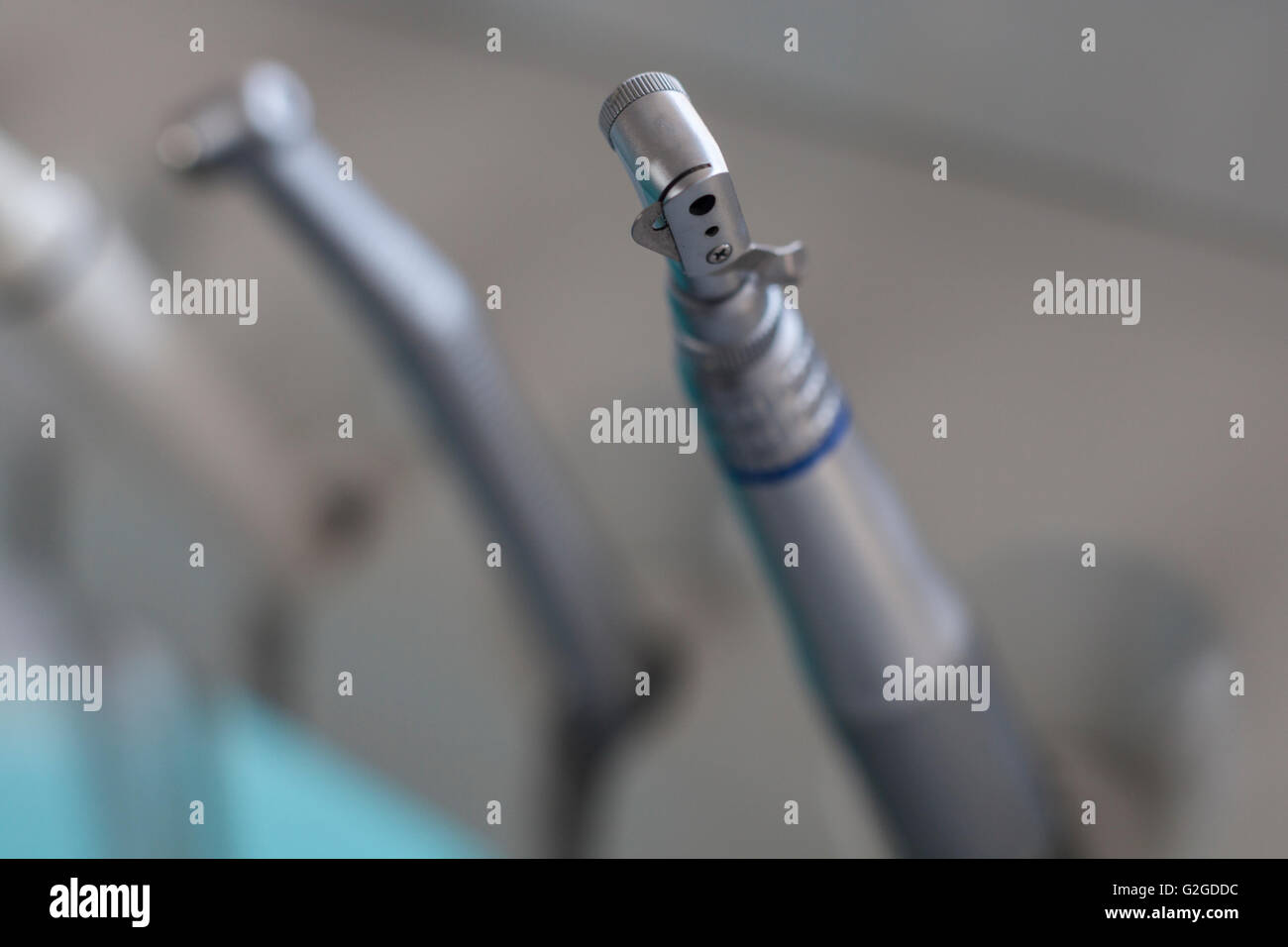 Dentist chair tools closeup on the hand piece drill Stock Photo - Alamy