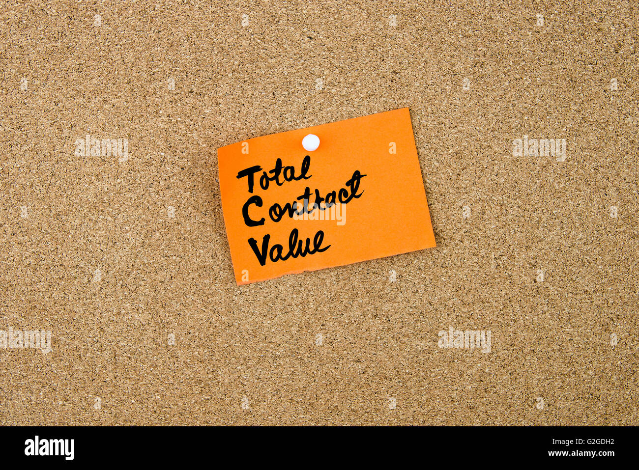 Business Acronym TCV Total Contract Value written on orange paper note ...