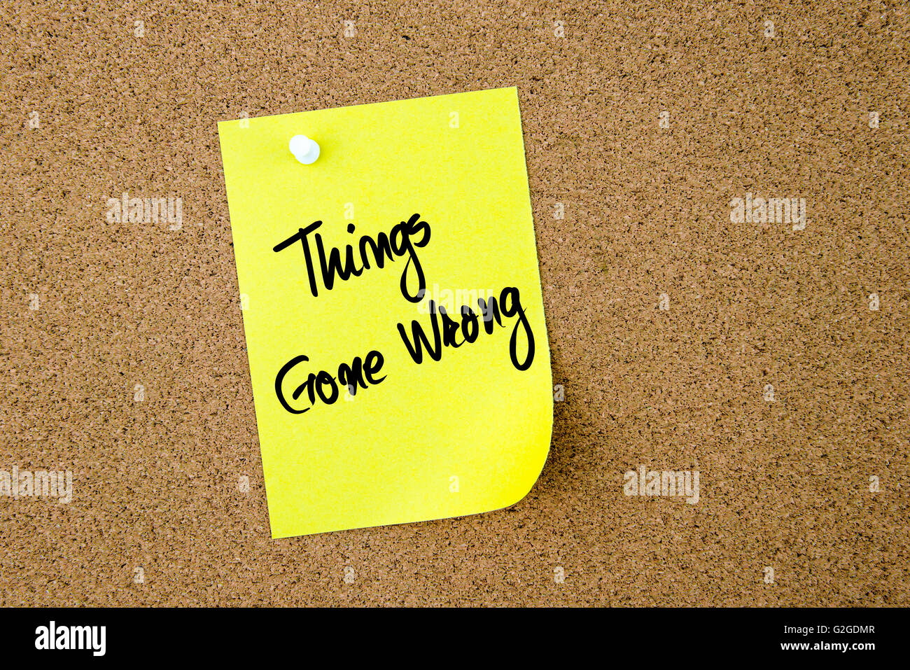 Things Gone Wrong written on yellow paper note pinned on cork board ...