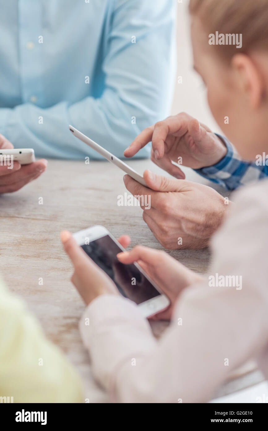 Group of diverse people using digital devices Stock Photo - Alamy