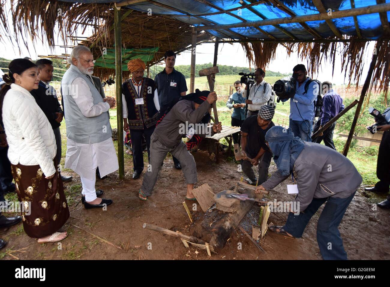 Indian Prime Minister Narendra Modi watches a crafts demonstration ...