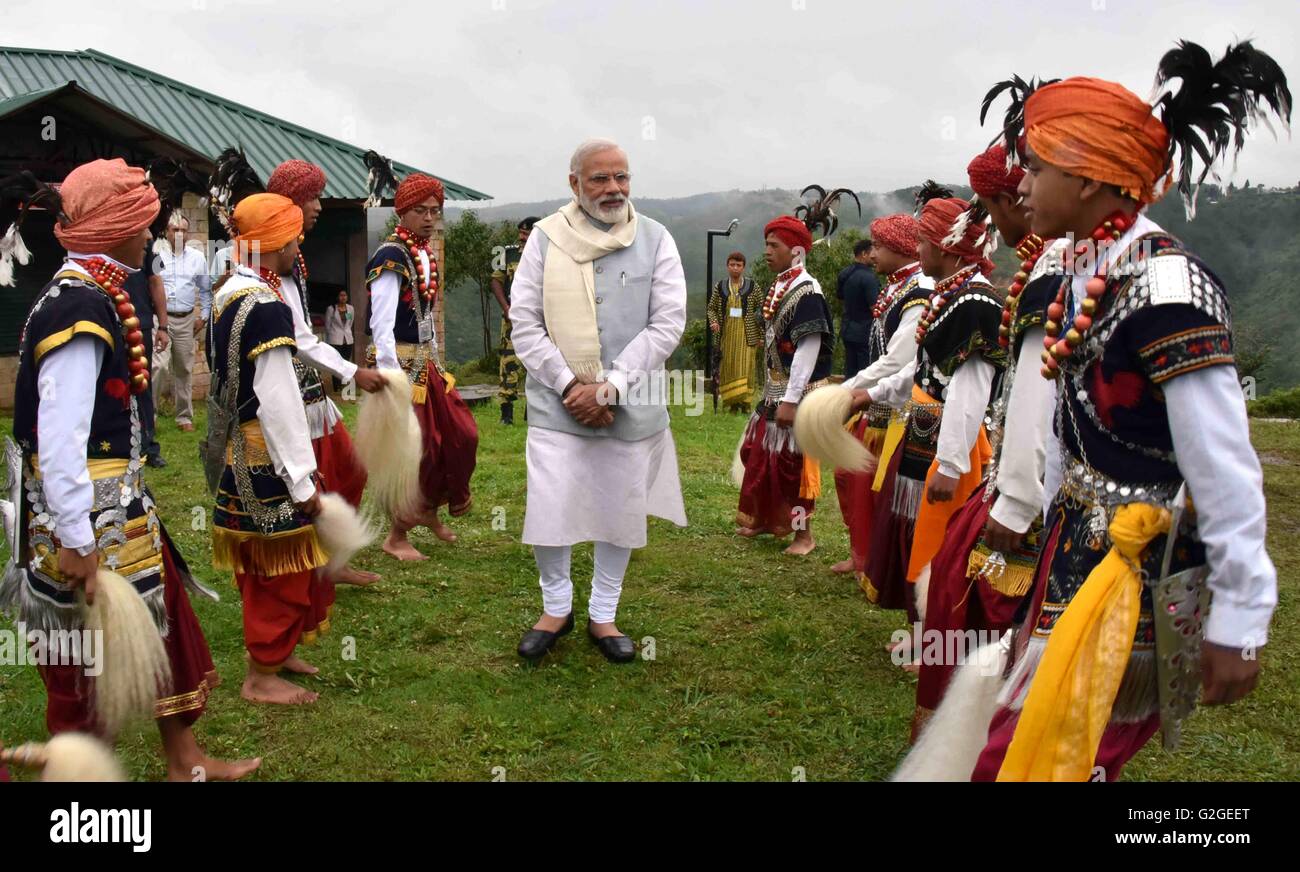 Indian Prime Minister Narendra Modi meets costumed members of the Khasi ...