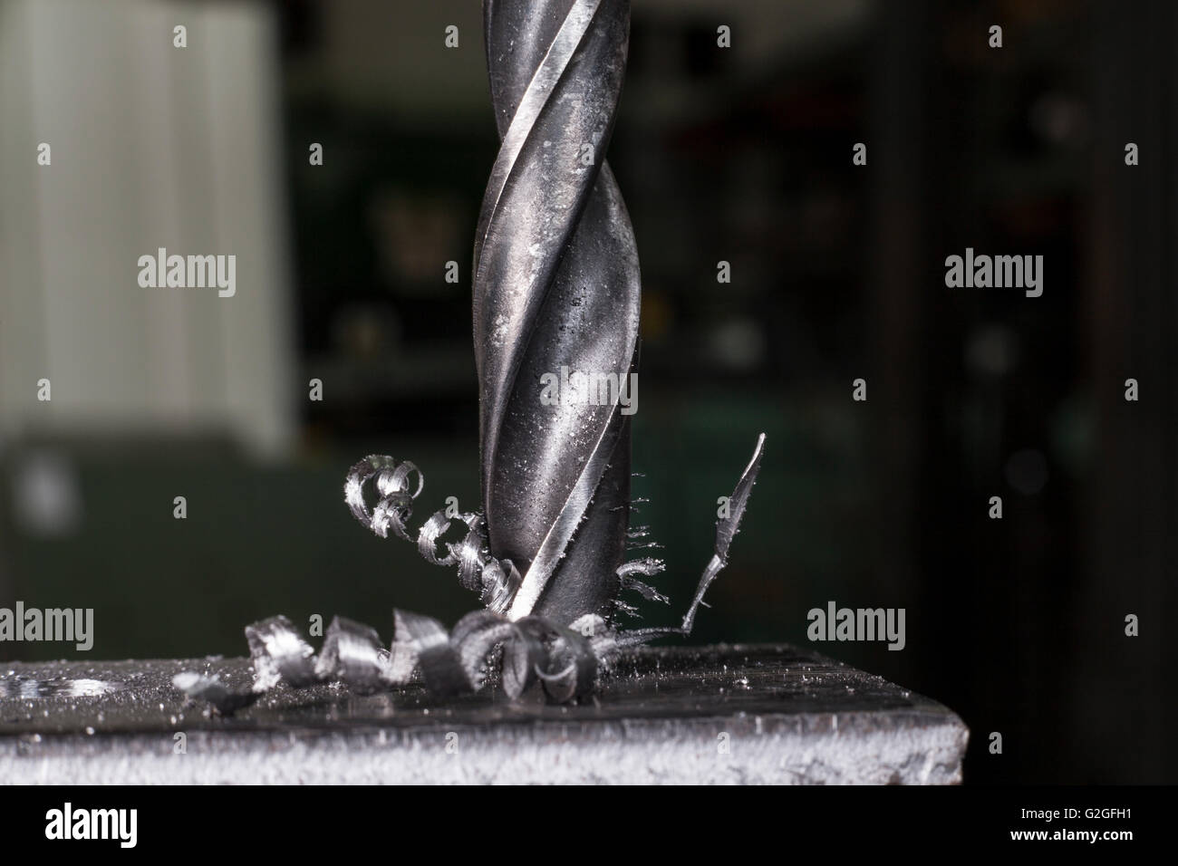 Metal drilling closeup in metal workshop Stock Photo - Alamy