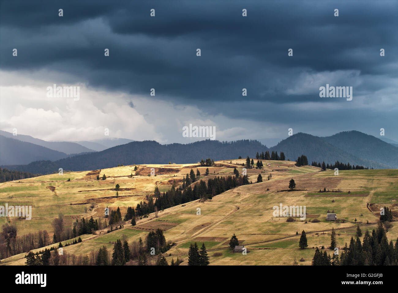Spring rain in mountains. Thunder and clouds Stock Photo - Alamy