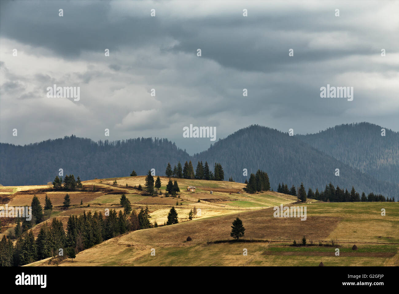 Spring rain in mountains. Thunder and clouds Stock Photo - Alamy