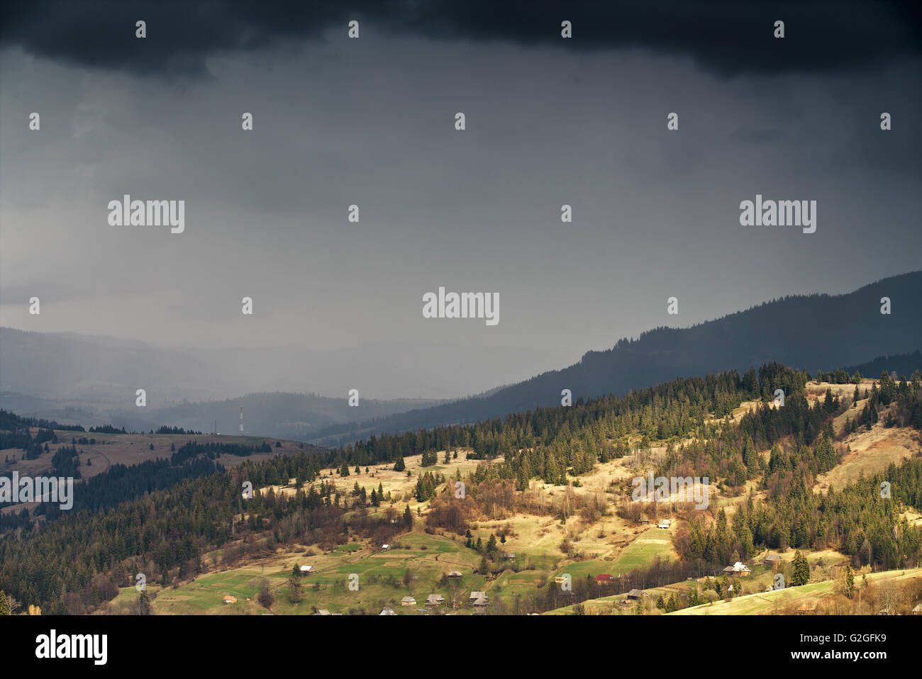 Spring rain in mountains. Thunder and clouds Stock Photo - Alamy