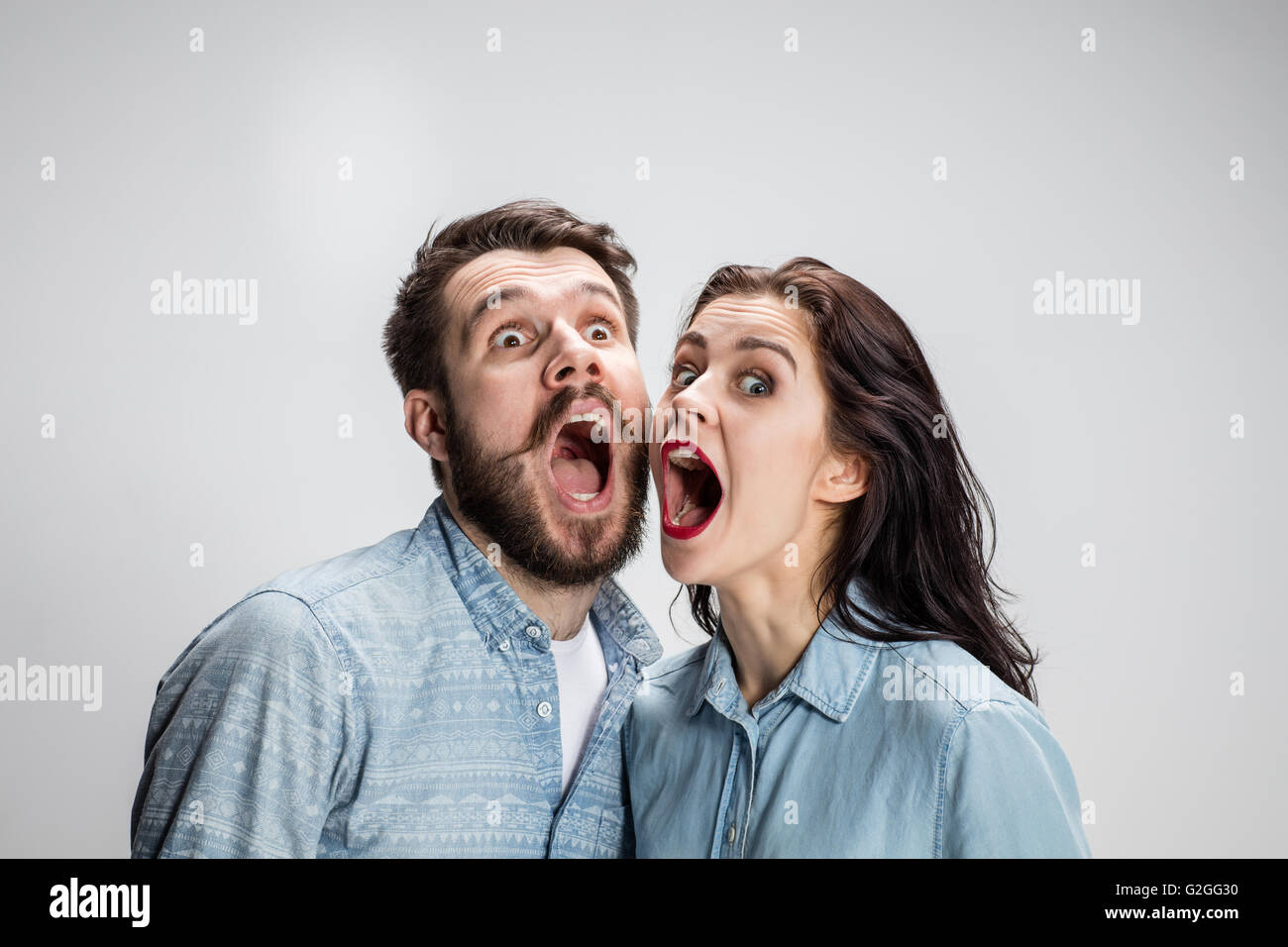 Close up photo of angry man and woman Stock Photo - Alamy