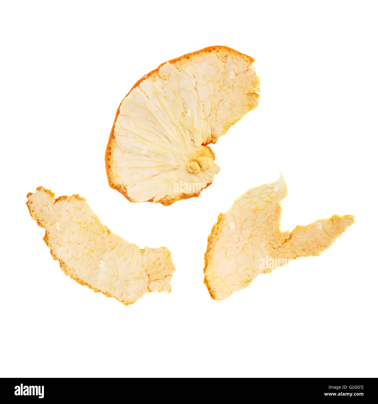 Parts of tangerine peel isolated on white background Stock Photo - Alamy