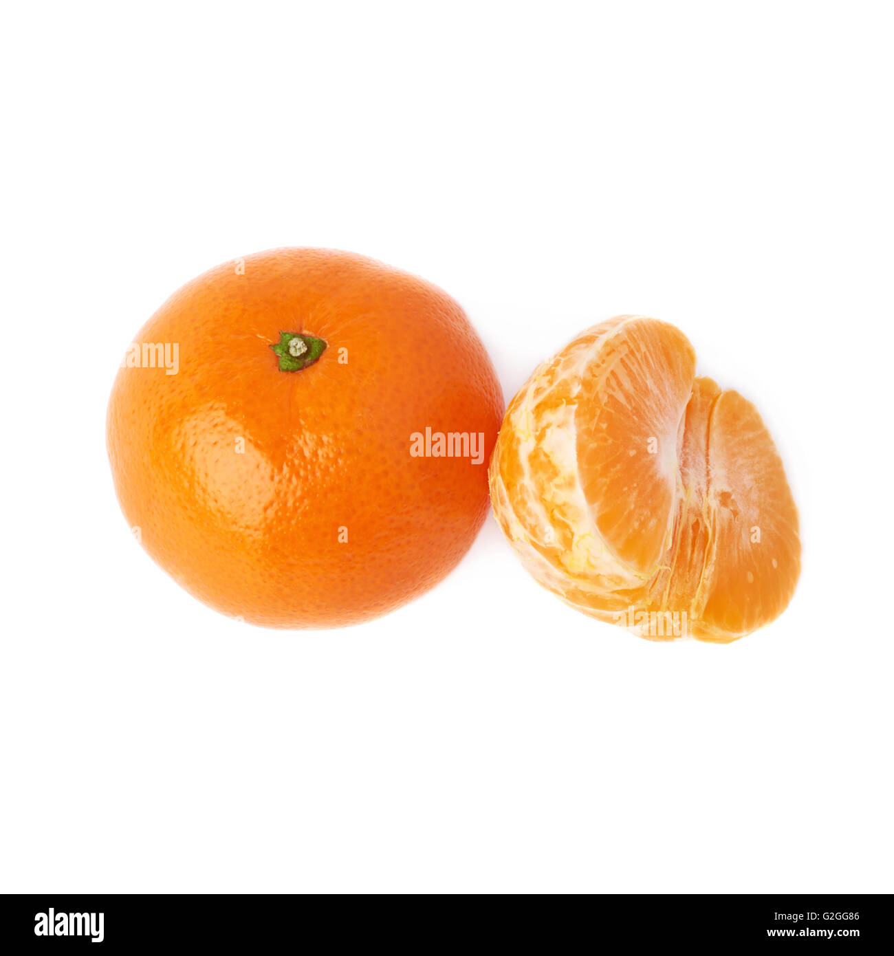 Half and fresh juicy tangerine fruit isolated over the white background ...