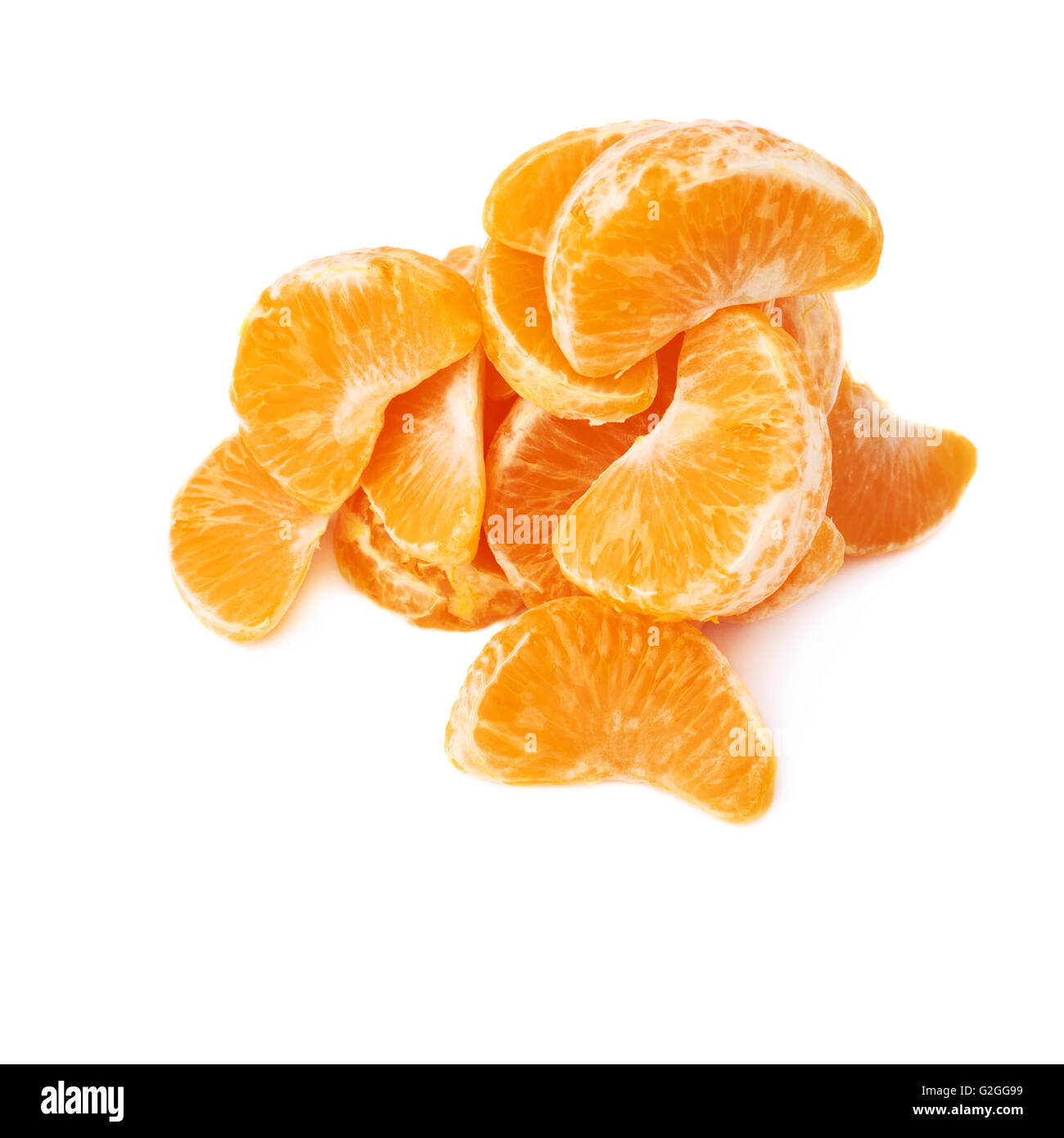 Pile of slice sections of tangerine isolated over the white background ...
