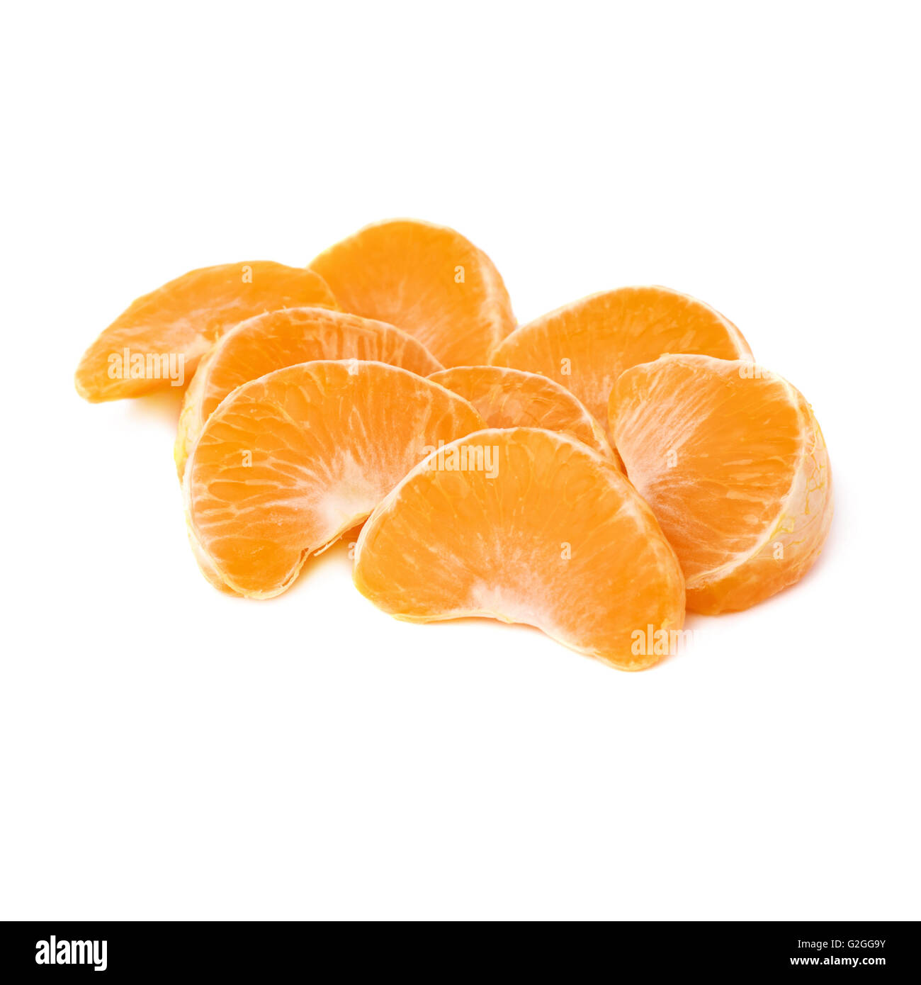 Pile of slice sections of tangerine isolated over the white background ...