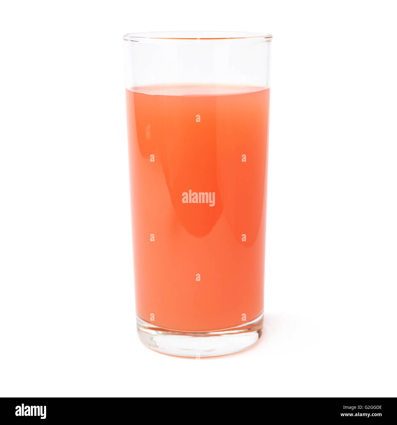Tall glass filled with the grapefruit juice isolated over the white ...