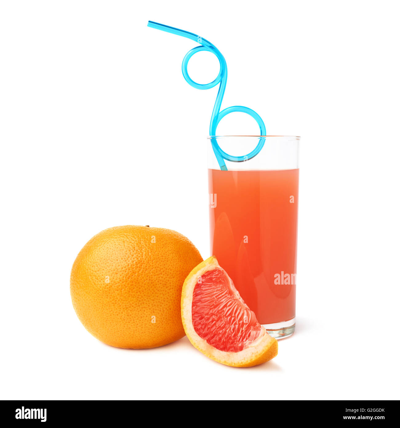 Tall glass filled with the grapefruit juice, blue curved drinking straw ...