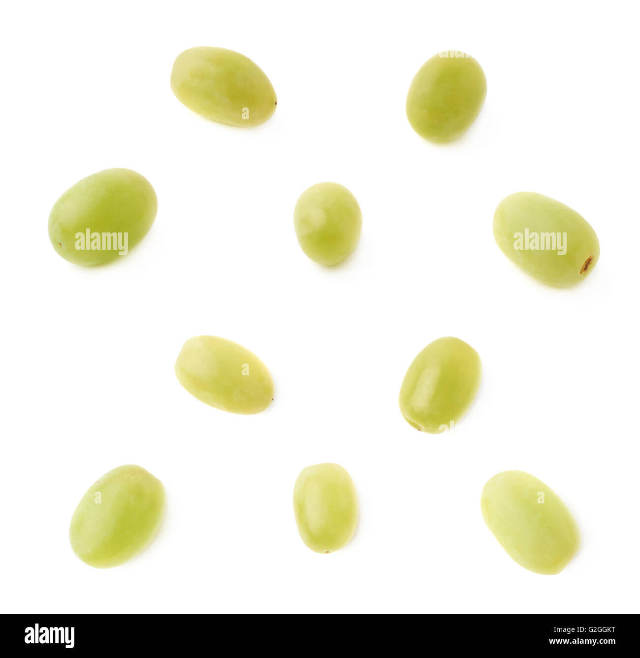 Five single white grapes isolated Stock Photo - Alamy