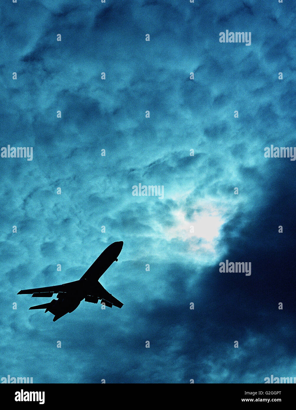 Airplane & Clouds Stock Photo - Alamy