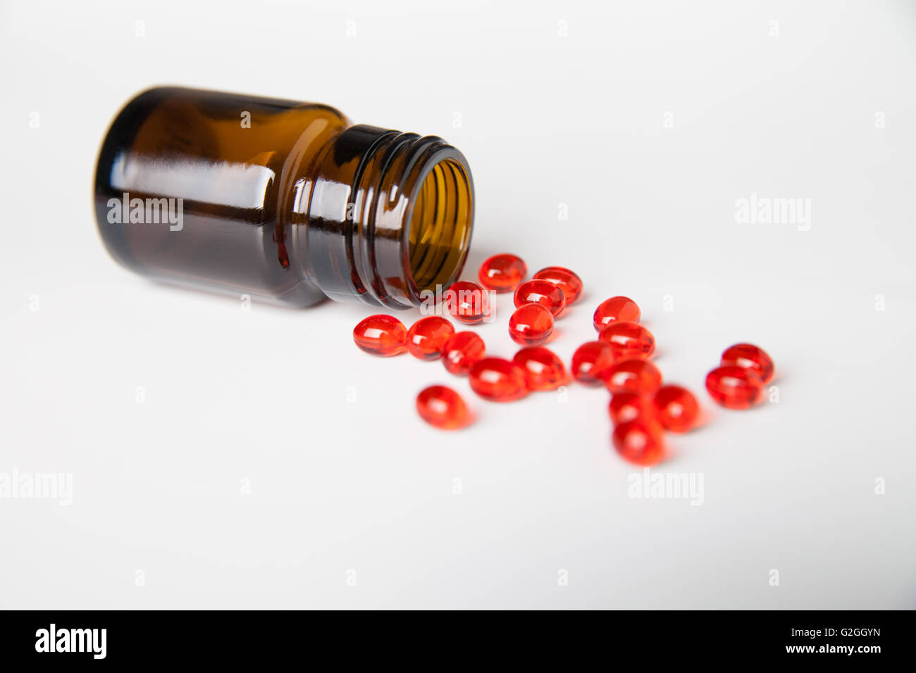 Pills scattered on white hi-res stock photography and images - Alamy