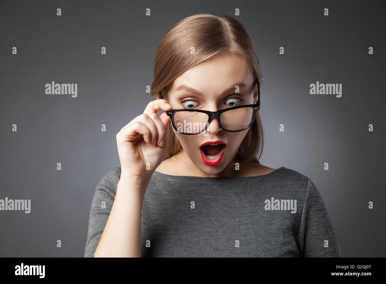 Surprise lady looking down hi-res stock photography and images - Alamy
