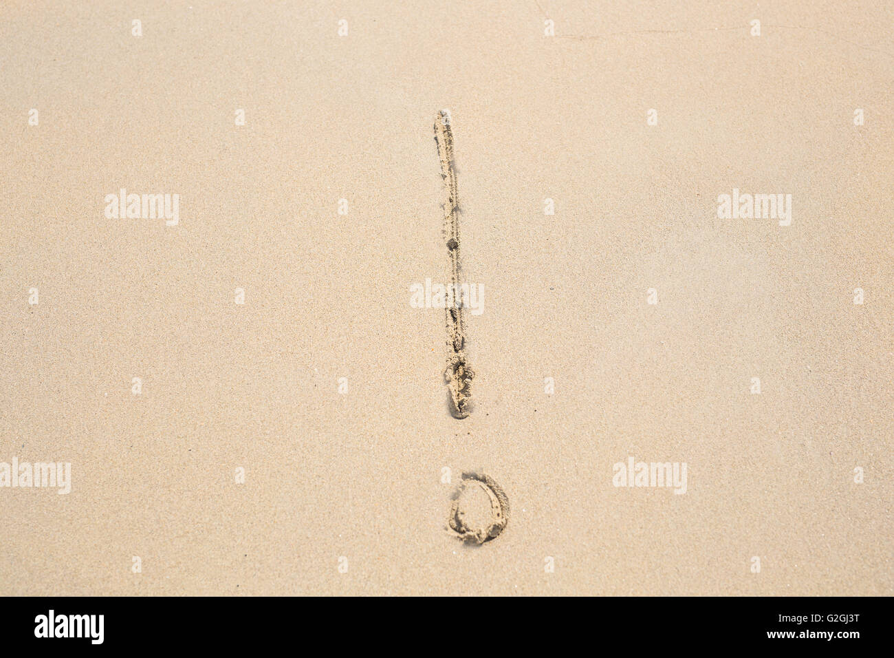 Exclamation mark symbol written on sand. Summer beach background Stock ...