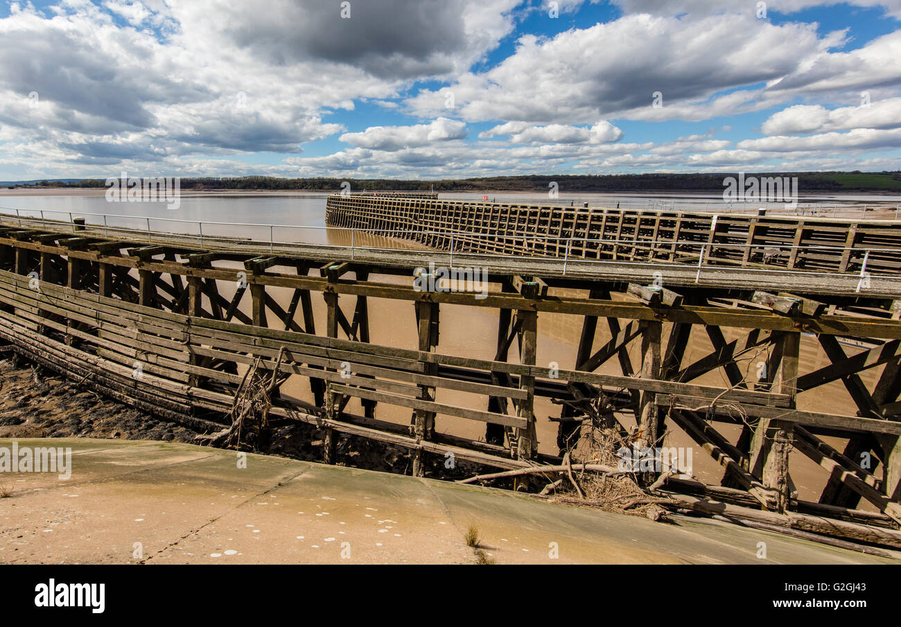 Wooden piers at the entrance to Sharpness harbour on the tidal Severn ...
