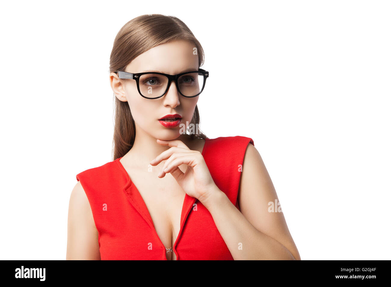 Beautiful lady in glasses thinking while looking up Stock Photo - Alamy