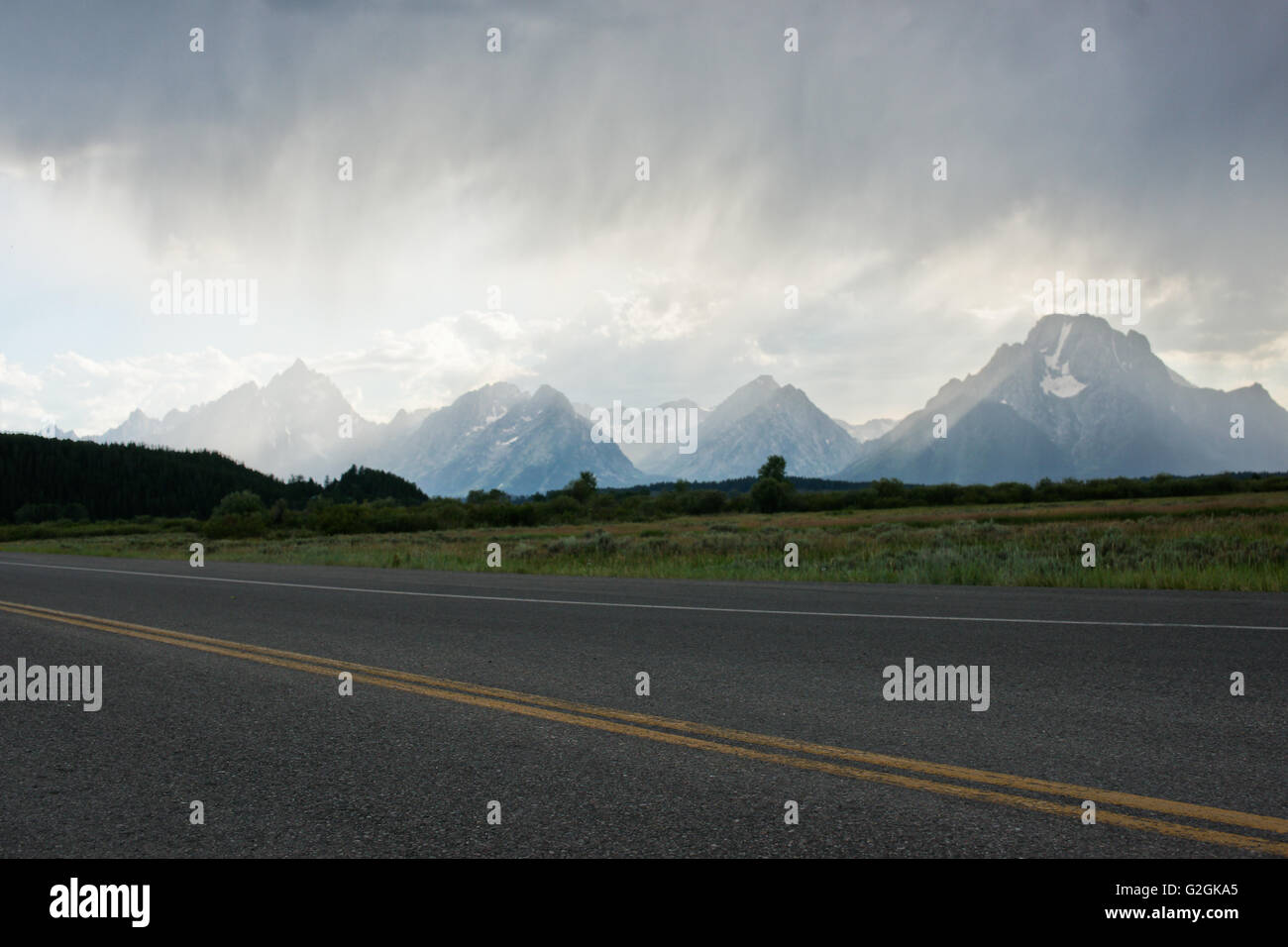 Road with Teton Mountain Range in Background, Grand Teton National Park ...
