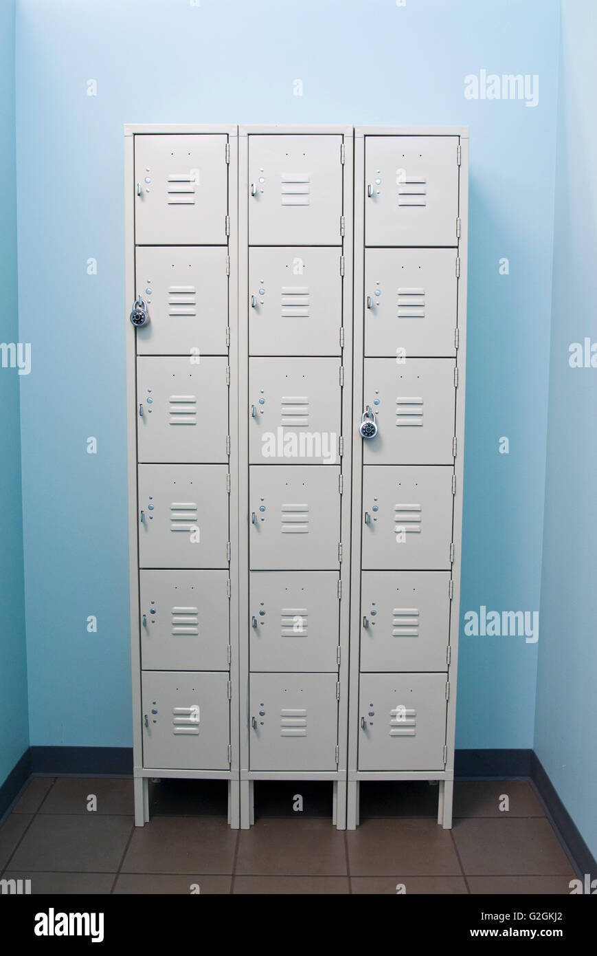 Three Columns of Metal Storage Lockers with Two Locks Stock Photo - Alamy