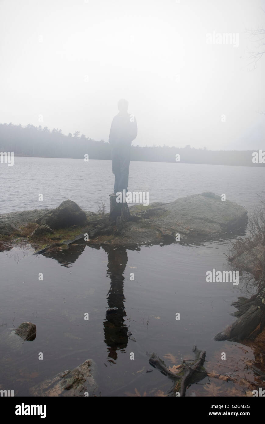 Man standing alone in fog hi-res stock photography and images - Alamy