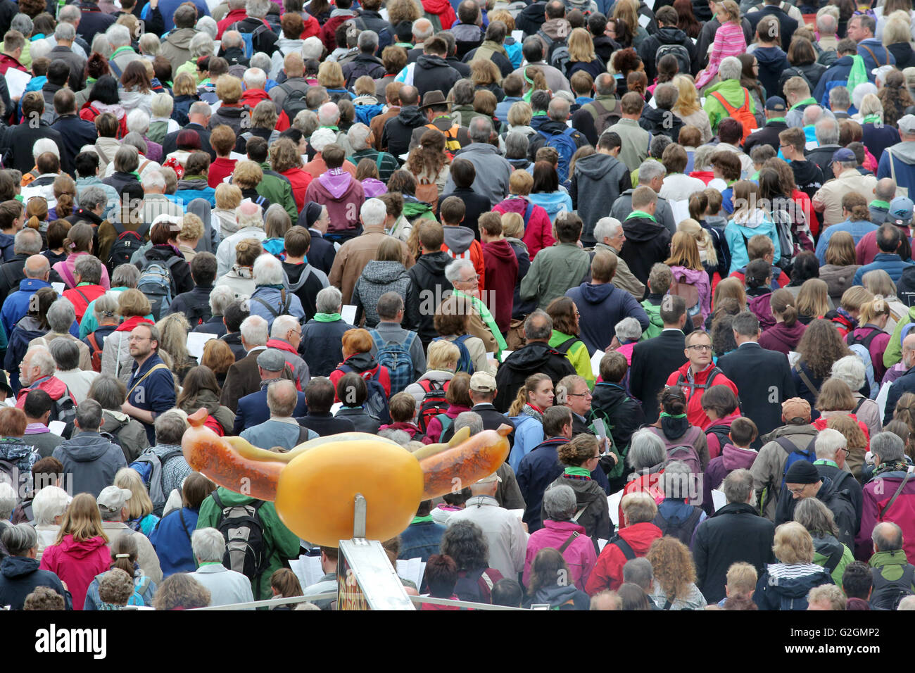 Giant German Bratwurst (sausage) on a food stall over the heads of ...