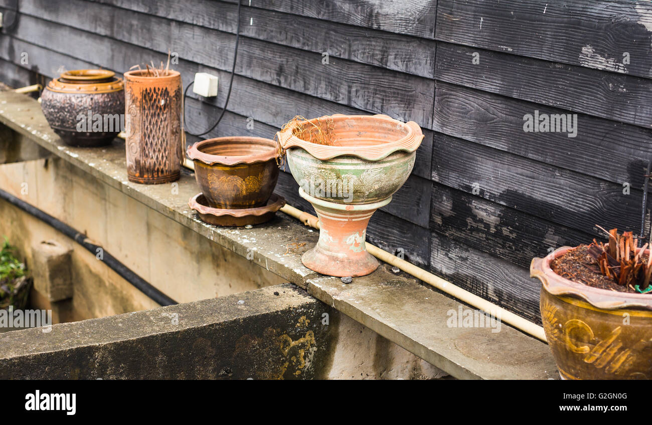 Classic ceramic huge pots outdoor Stock Photo - Alamy