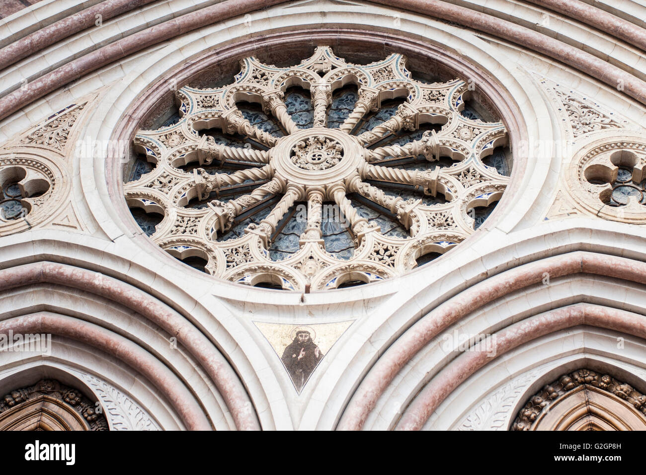 Detail of rose window in lower Basilica of saint Francis, Assisi Umbria ...