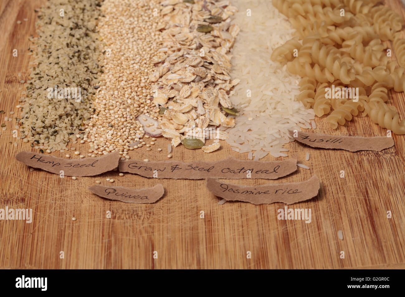 Multiple organic grains, including fusilli, jasmine rice, quinoa, hemp ...