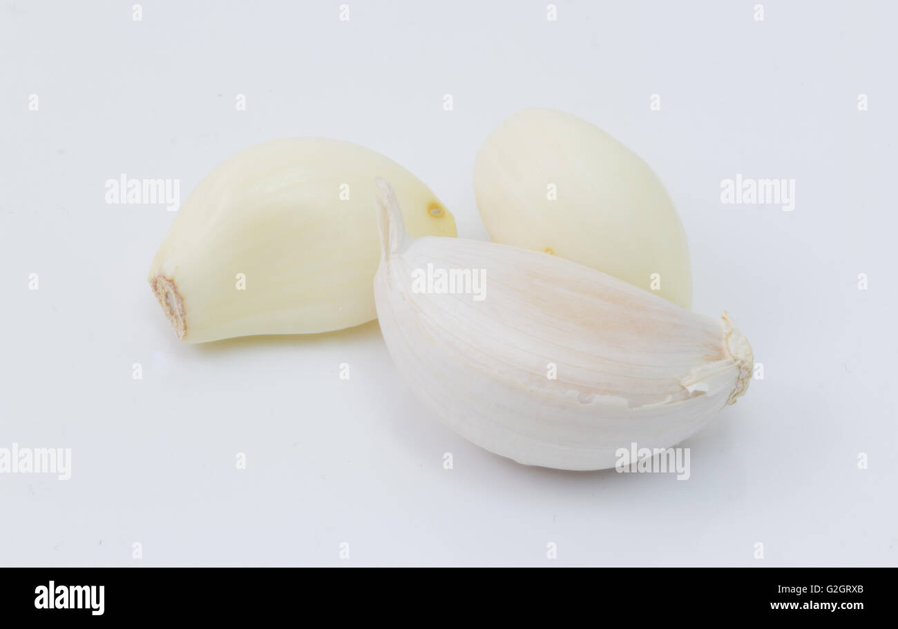 Fresh white garlic isolated on white background Stock Photo - Alamy
