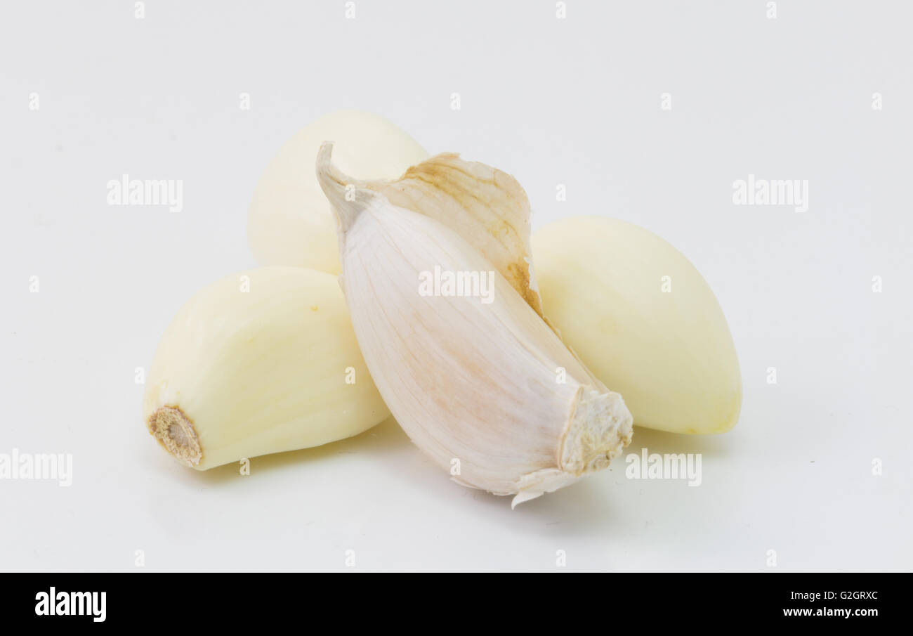 Fresh white garlic isolated on white background Stock Photo - Alamy