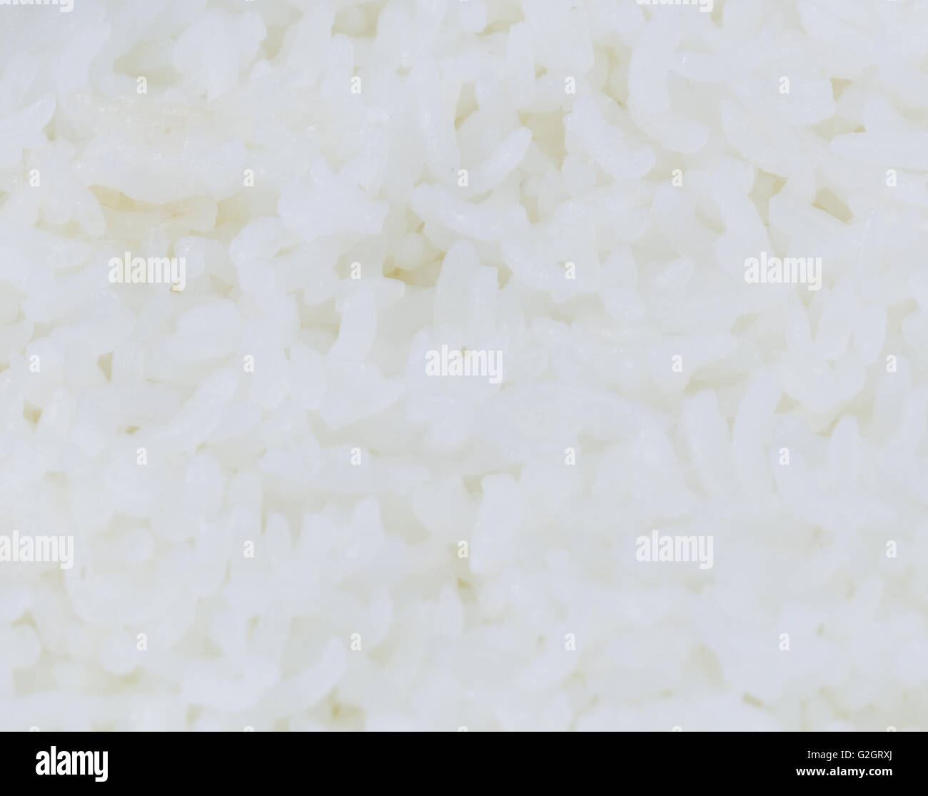 cooked white rice background texture close up Stock Photo - Alamy