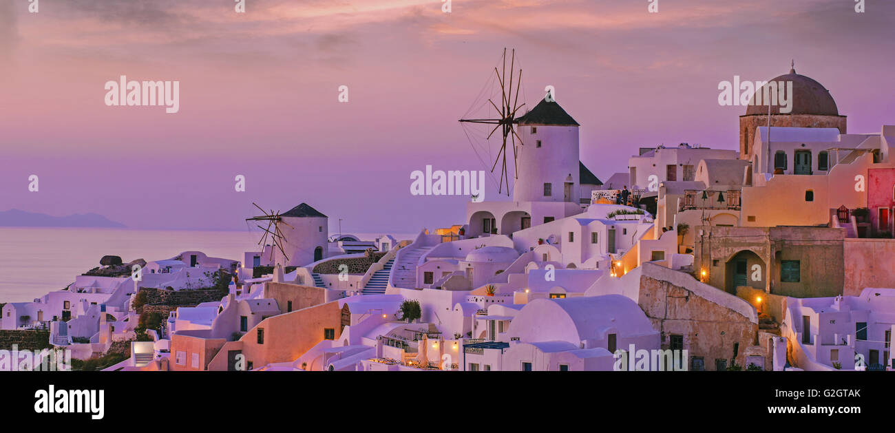 The windmills of Oia in Santorini island, famous for their sunset view ...