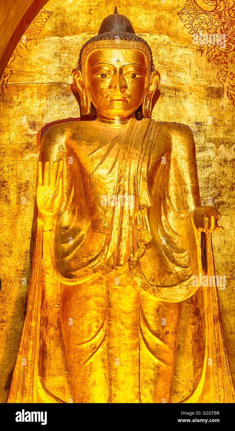 Buddha statue in Ananda temple in Bagan. Myanmar Stock Photo - Alamy
