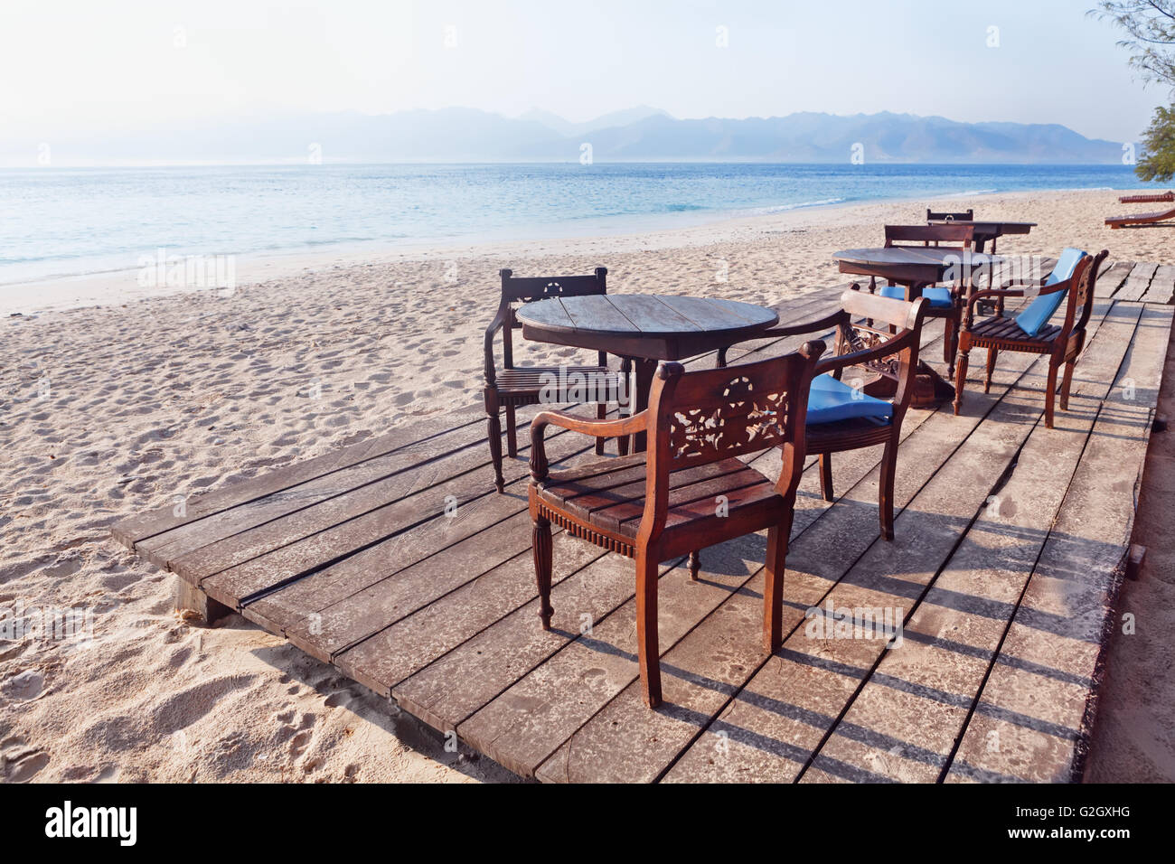 Beautiful scene on morning desert beach with white sand, clear water on ...