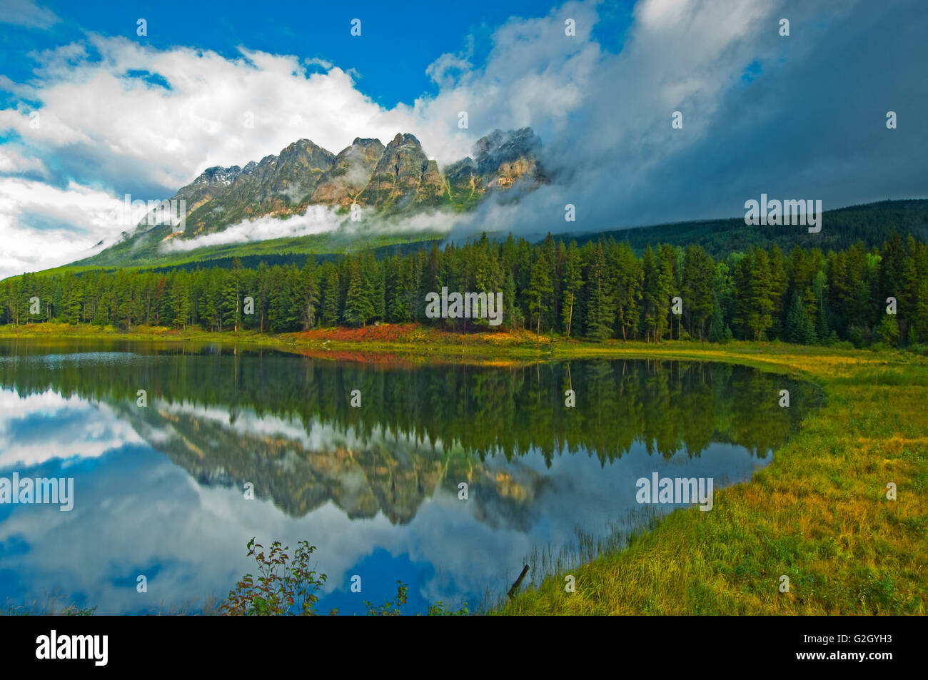 Whitney Lake and Yellowhead Mountain shrouded in cloud Mt. Robson ...